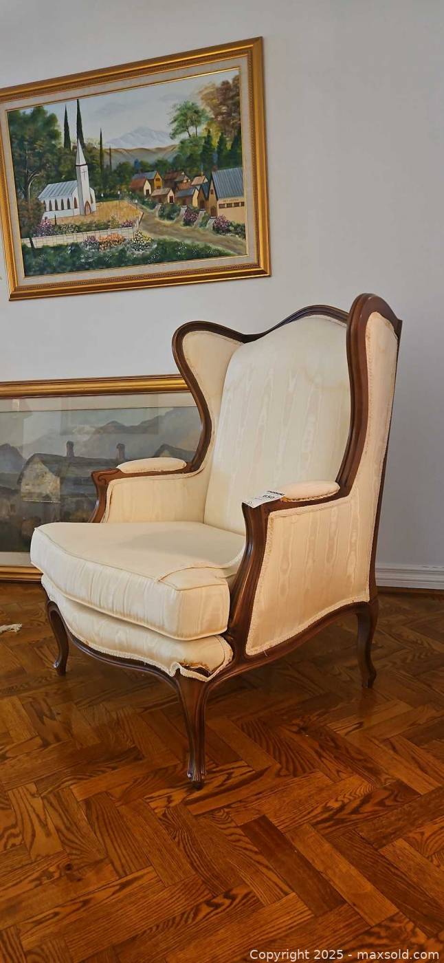 Wood framed upholstered wingback chair | Maxsold