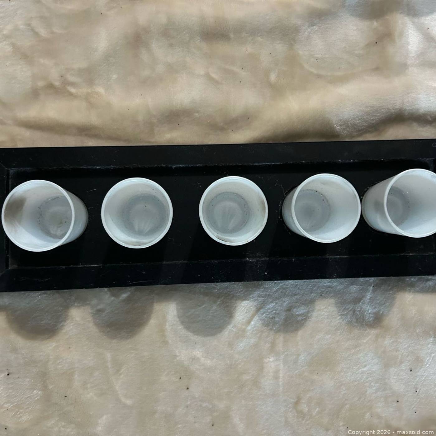 Wooden base with five white tealight holders | Maxsold