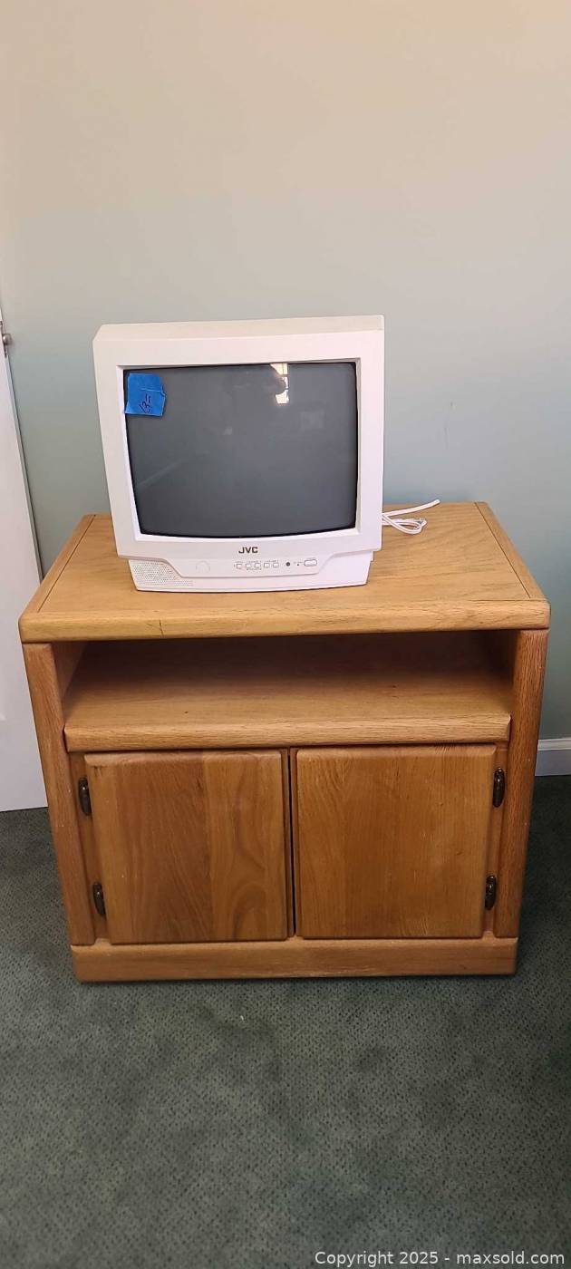 Bookshelf, solid wood TV stand, 13" JVC CRT TV | Maxsold