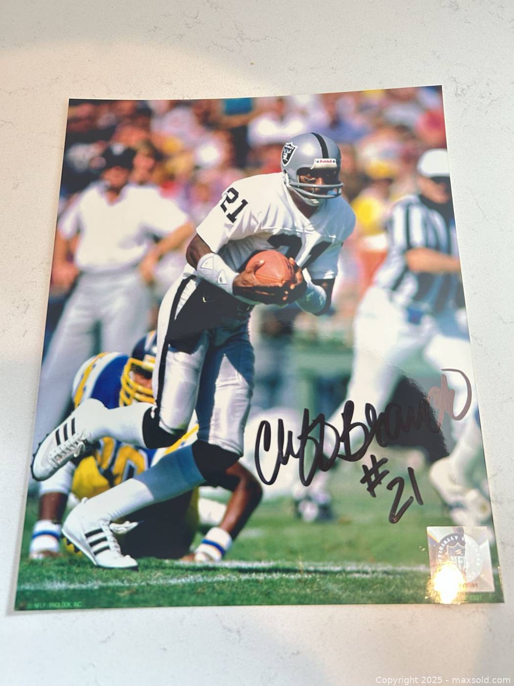 Cliff Branch signed 8x10 photo | Maxsold
