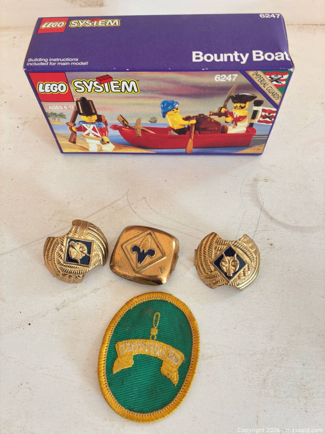 LEGO 6247 Bounty Boat box, 3 Scout brass slides, patch | Maxsold