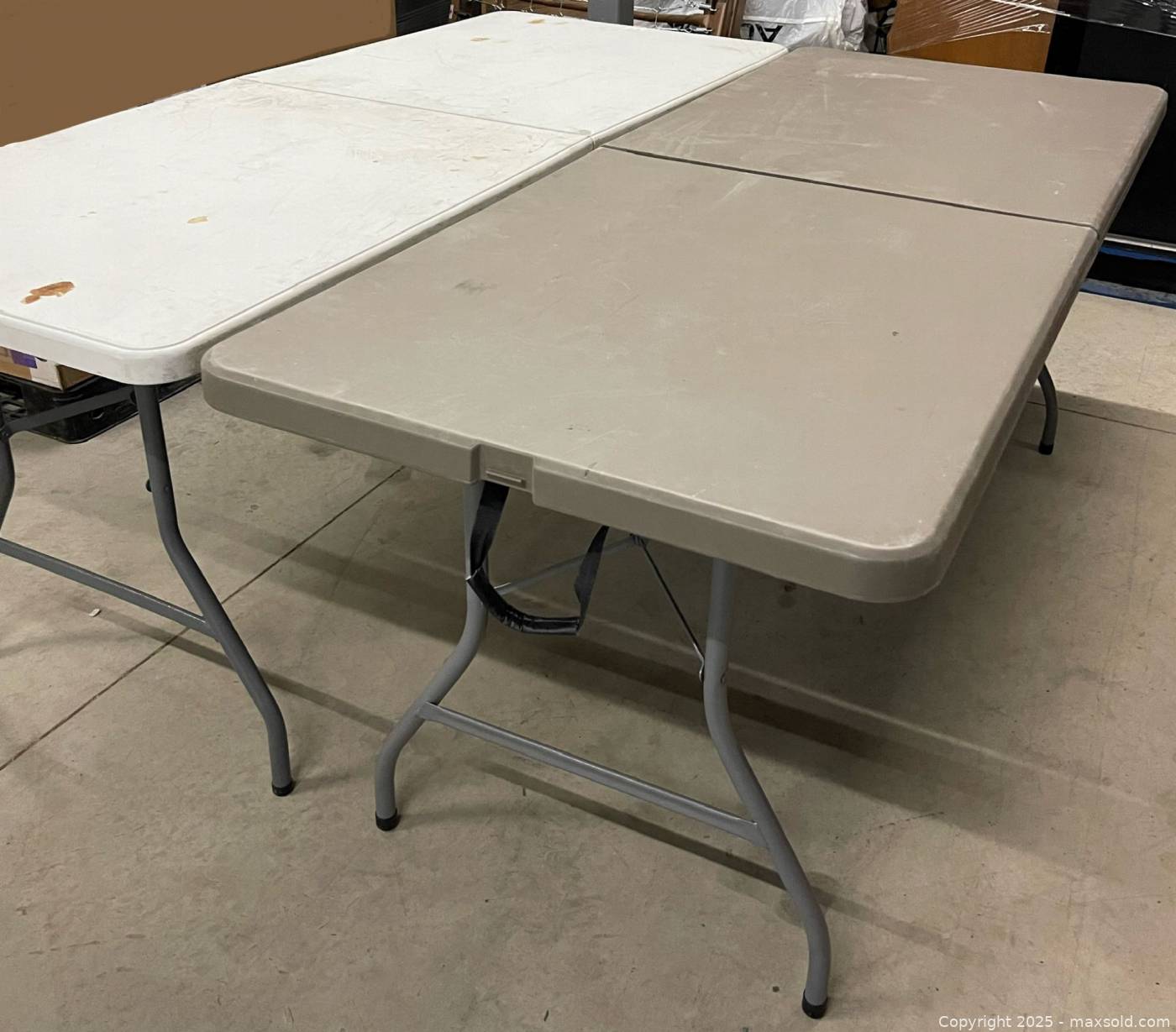 Two portable folding tables | Maxsold