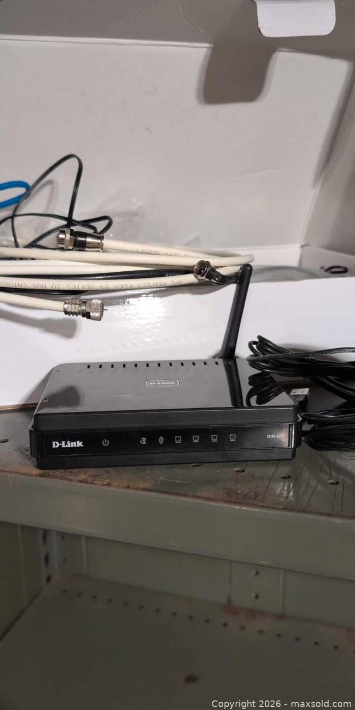 Dell monitor, D-Link DIR-601 router, keyboards, mice and cables | Maxsold