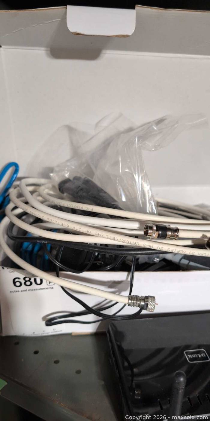 Dell monitor, D-Link DIR-601 router, keyboards, mice and cables | Maxsold