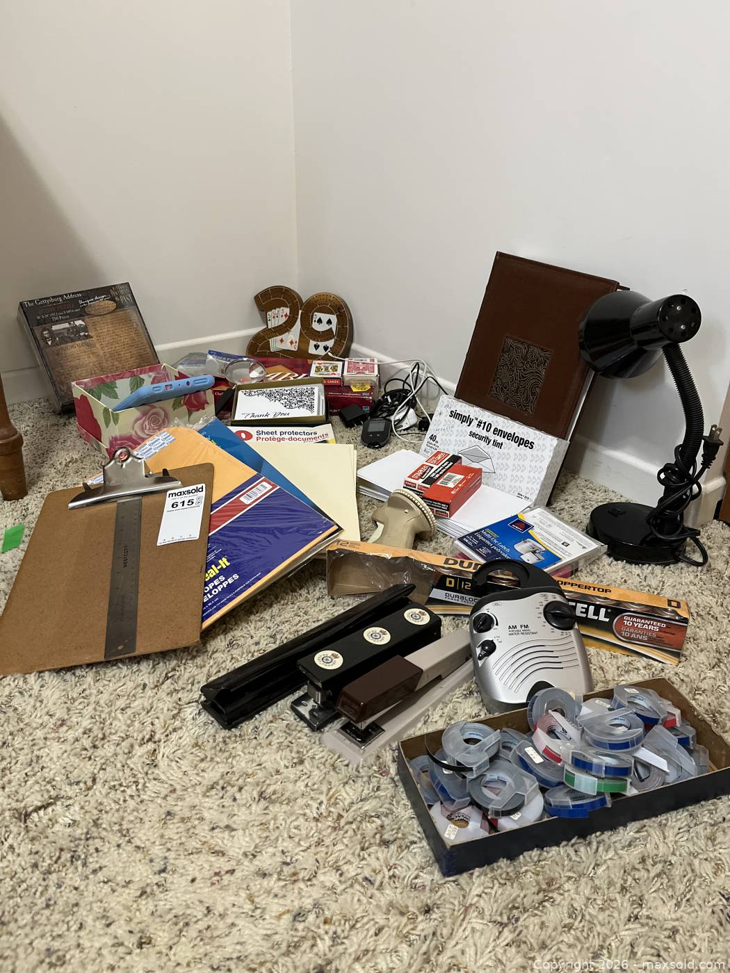 Mixed office supplies, electronics, games | Maxsold
