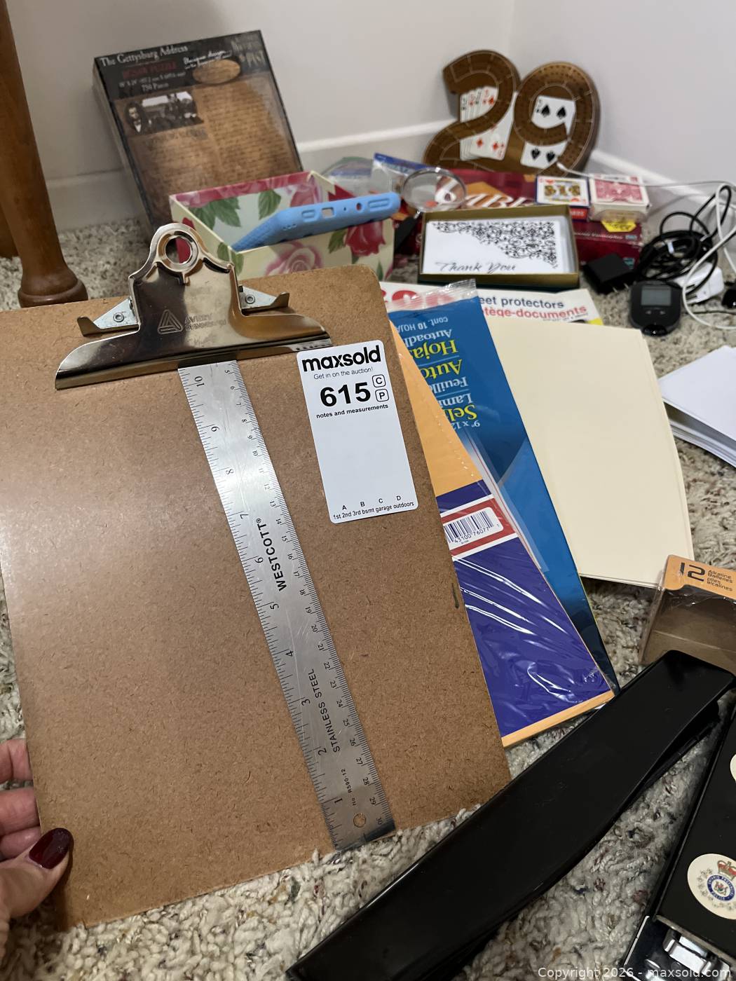 Mixed office supplies, electronics, games | Maxsold