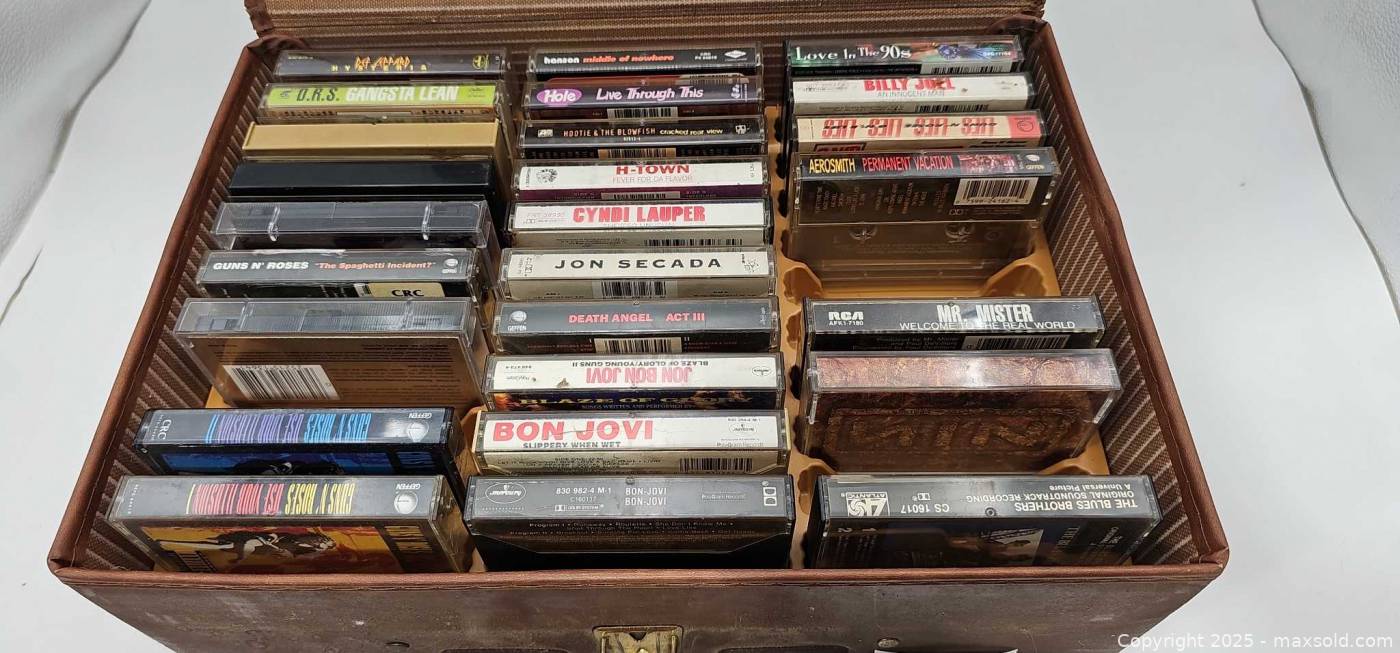 Cassette tape collection with carrying case | Maxsold