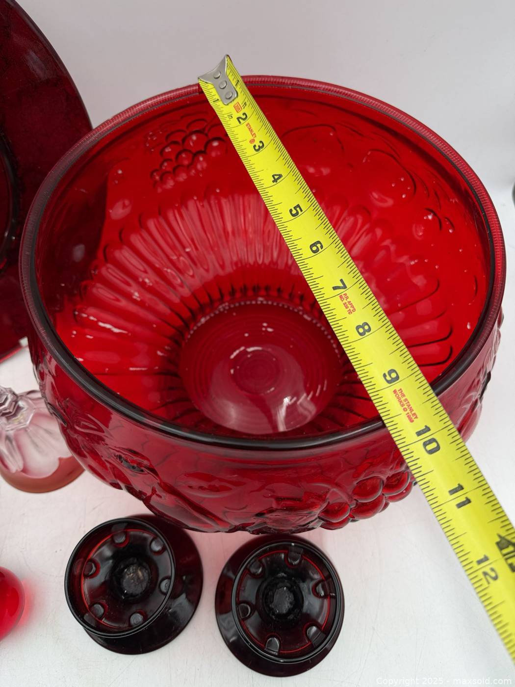 Ruby red glass serving and decor pieces | Maxsold