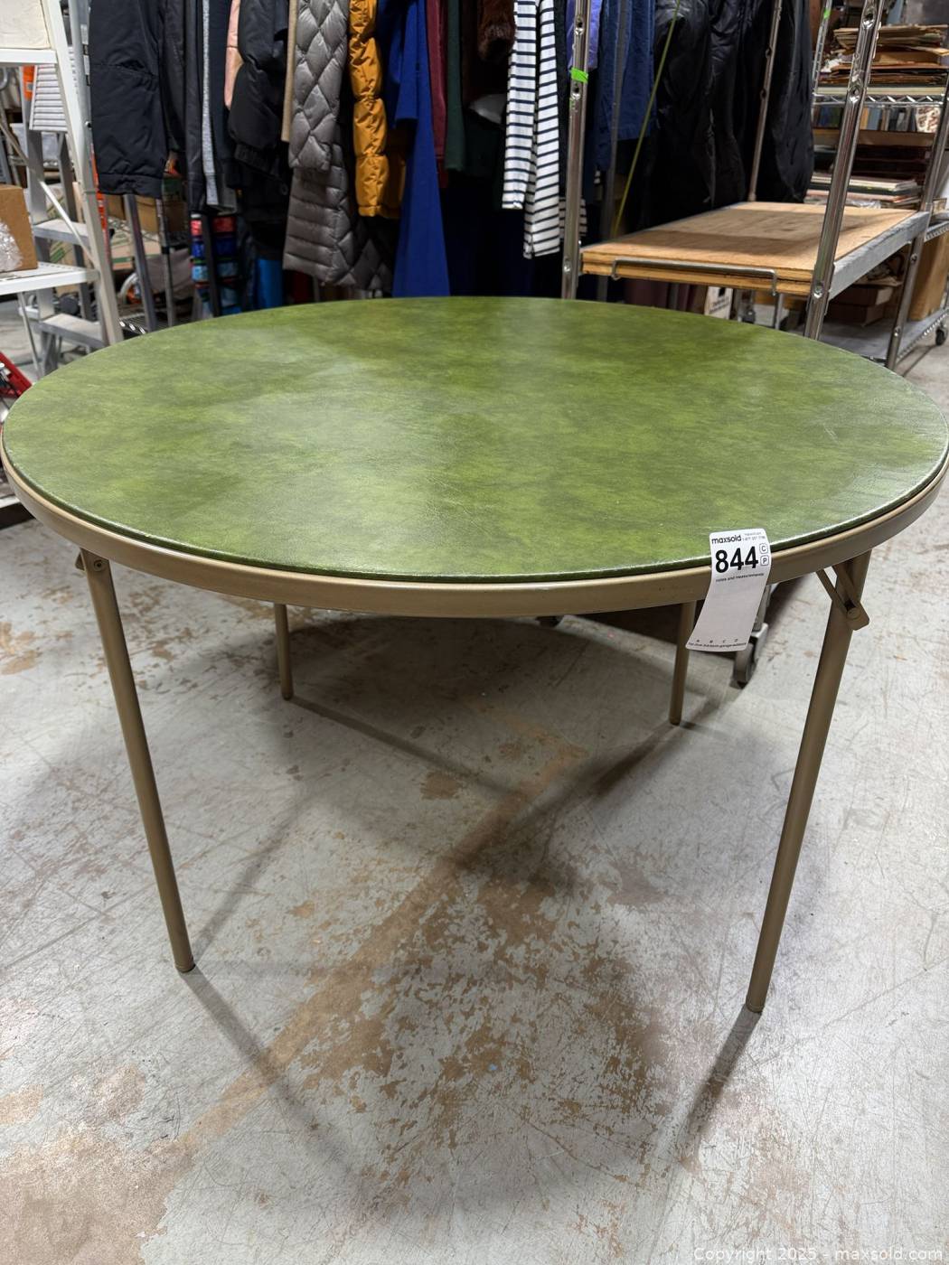 Vintage circular folding card table | Maxsold