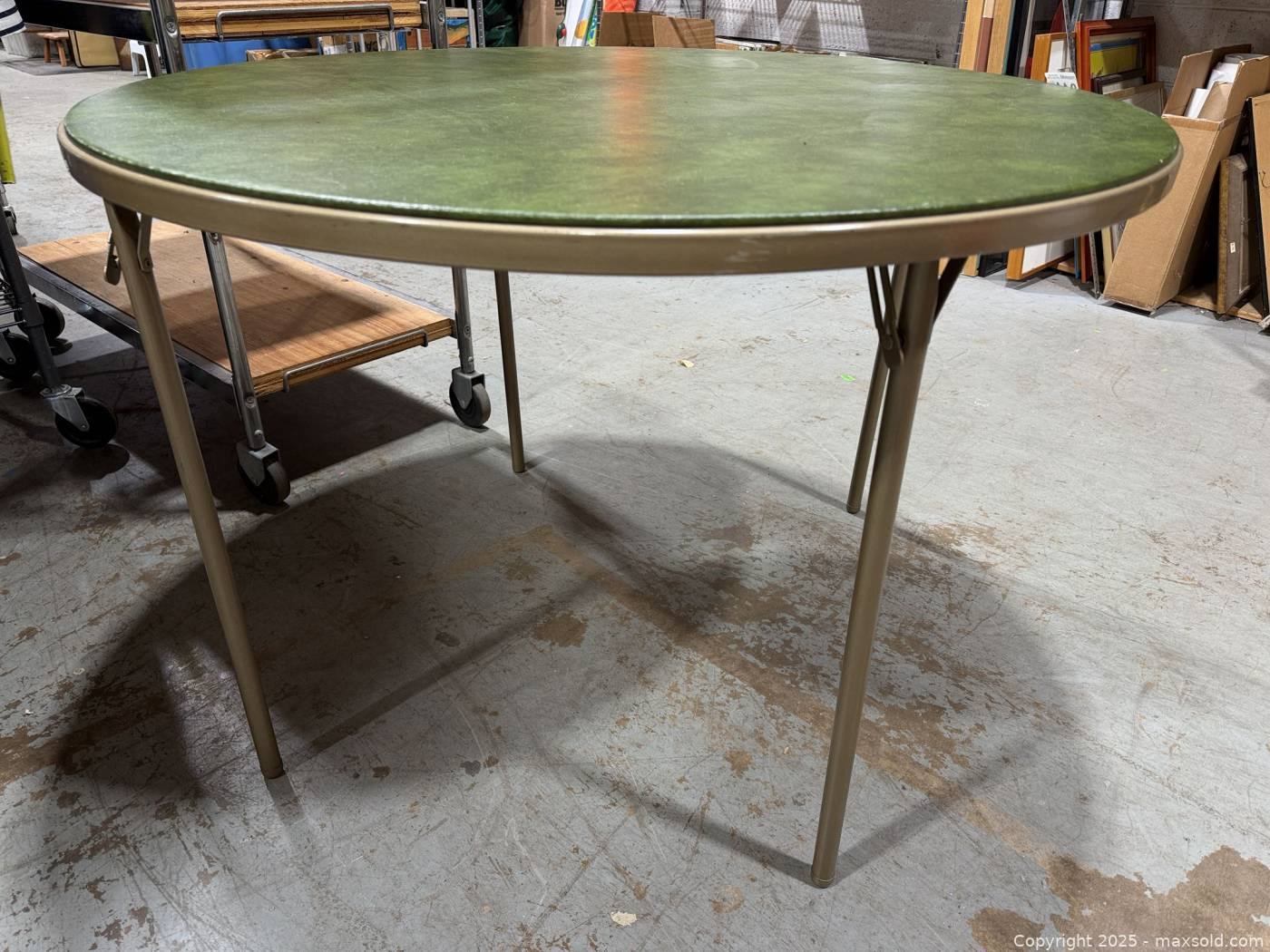 Vintage circular folding card table | Maxsold