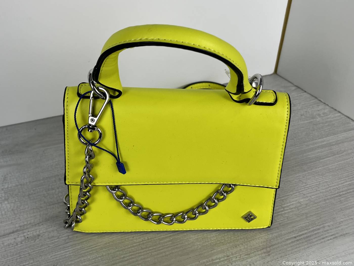 Call It Spring neon yellow handbag | Maxsold