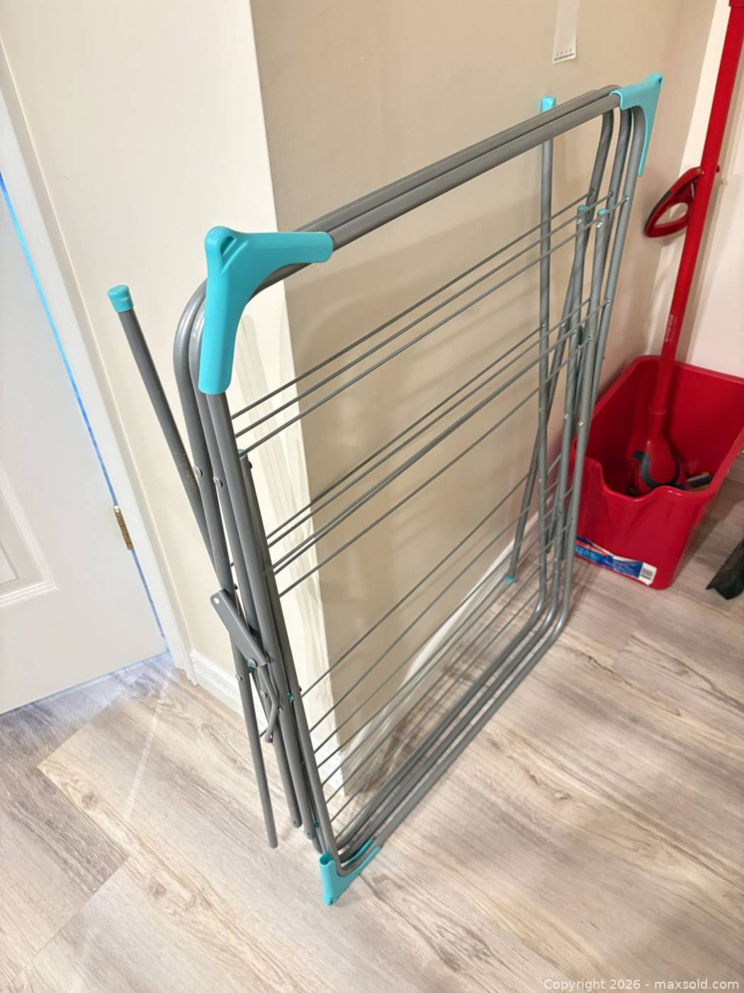 Foldable drying rack, mop & bucket, broom, ironing board | Maxsold