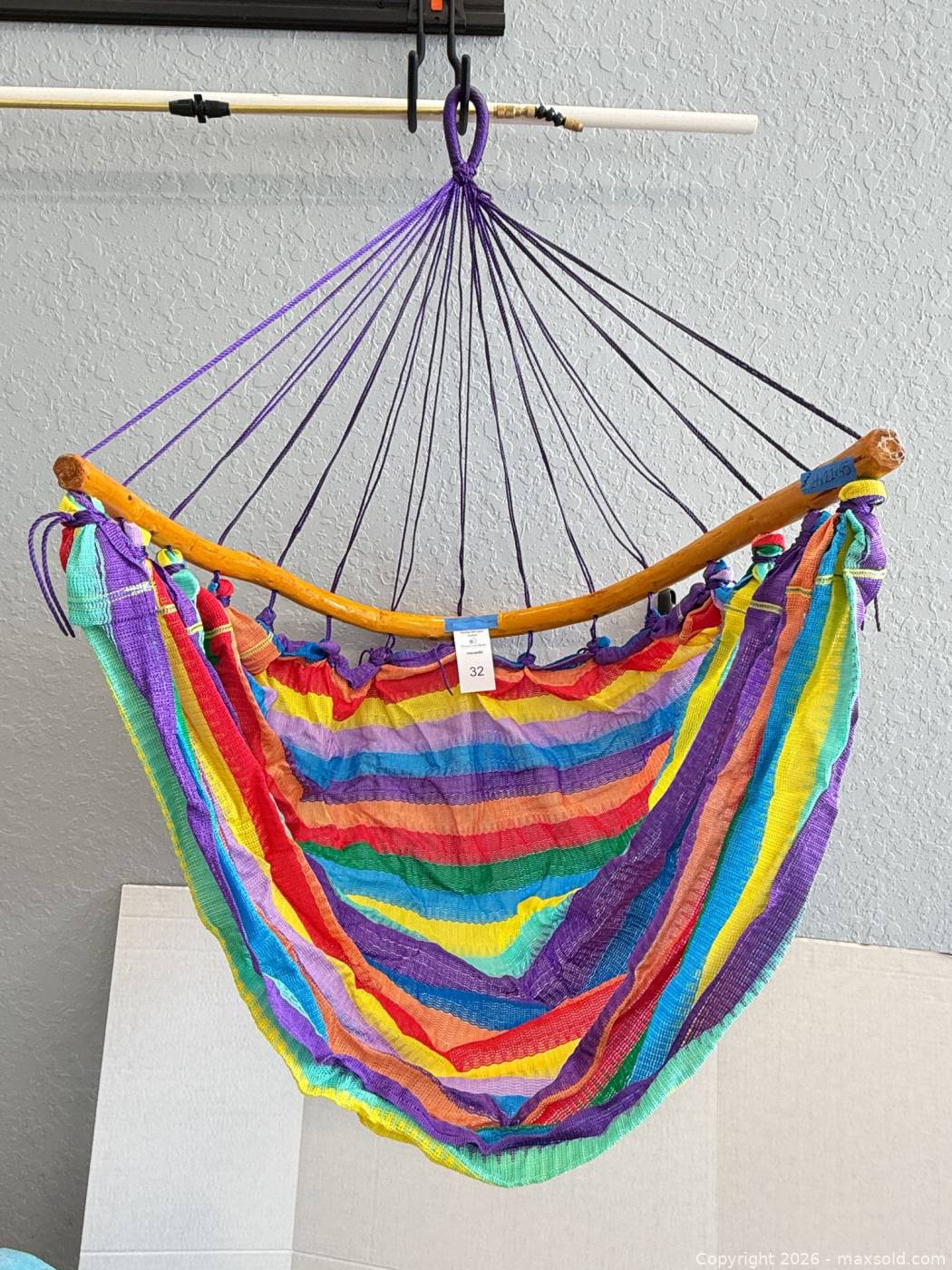 Rainbow hanging hammock chair with wooden spreader bar | Maxsold