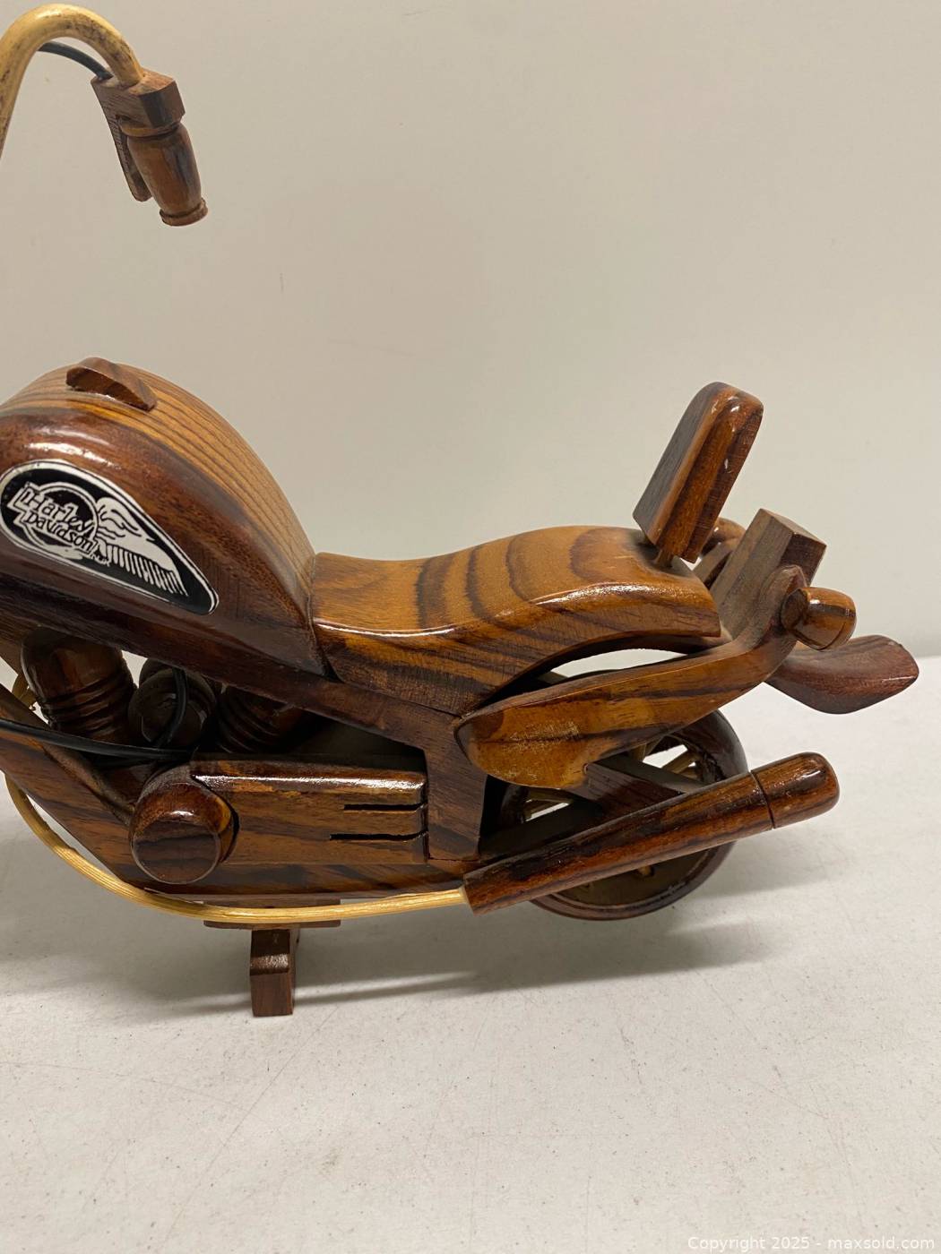 Hand-carved wooden motorcycle model | Maxsold