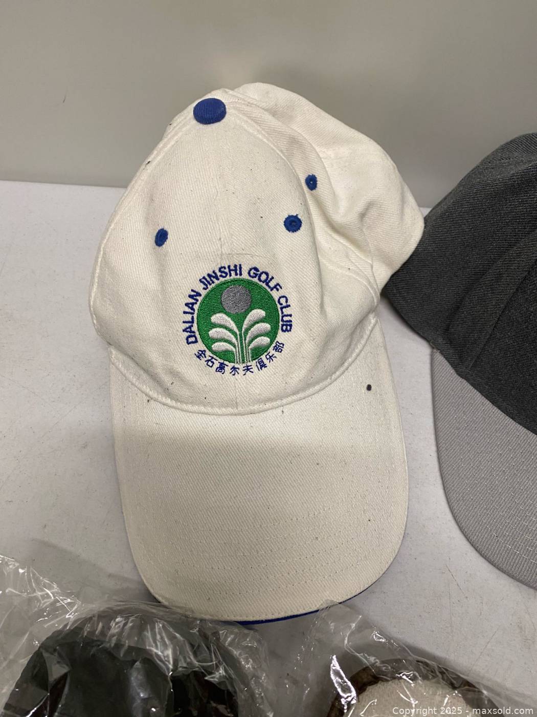 3 Baseball Caps & New Hotel Airline Slippers | Maxsold