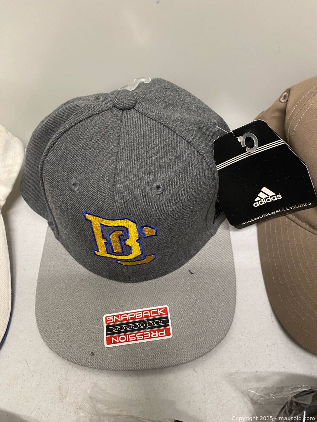 3 Baseball Caps & New Hotel Airline Slippers | Maxsold