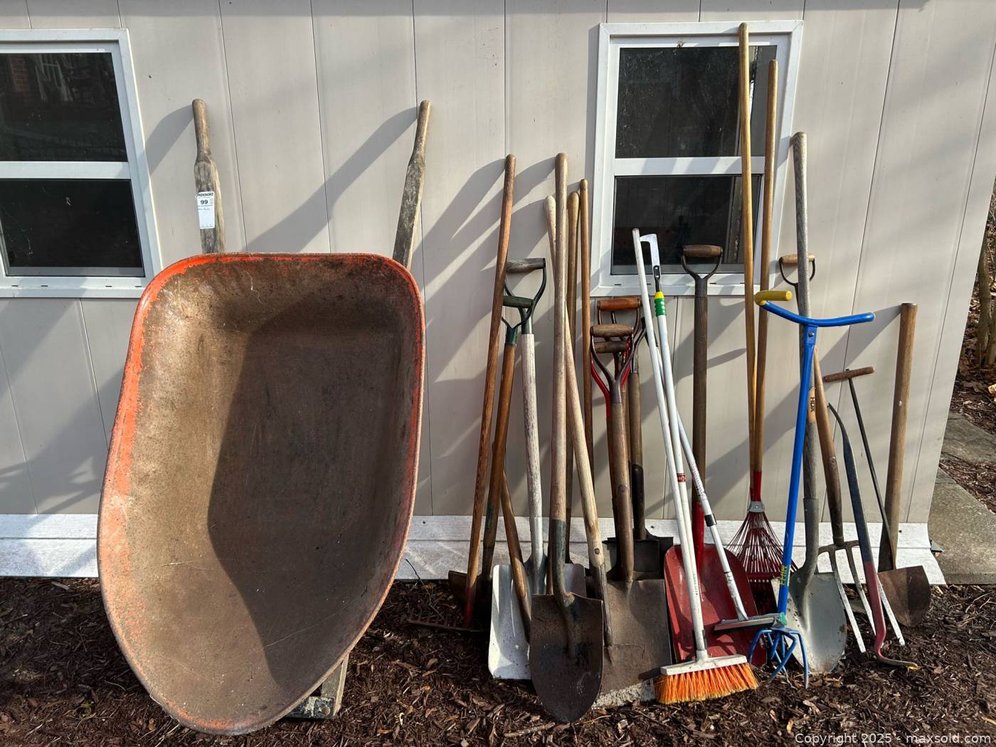 Wheelbarrow With Assorted Garden Tools | Maxsold
