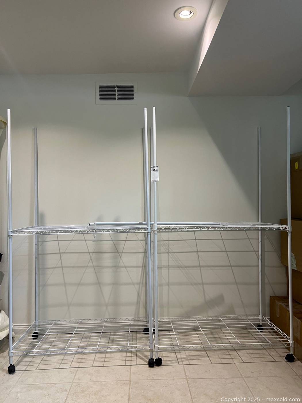 Pair metal wire storage shelving units on casters | Maxsold