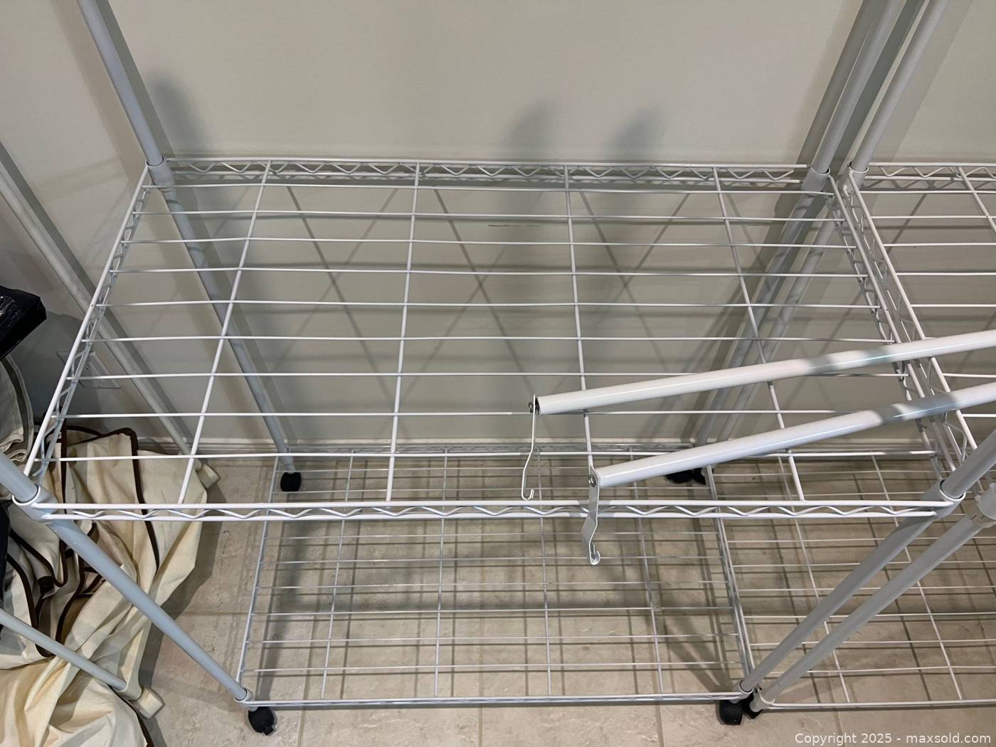 Pair metal wire storage shelving units on casters | Maxsold
