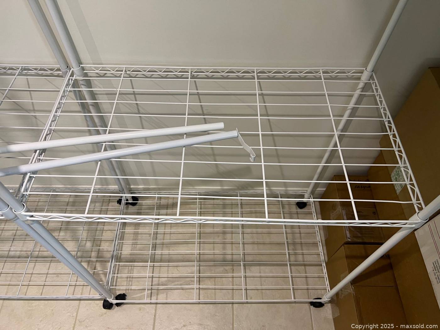 Pair metal wire storage shelving units on casters | Maxsold