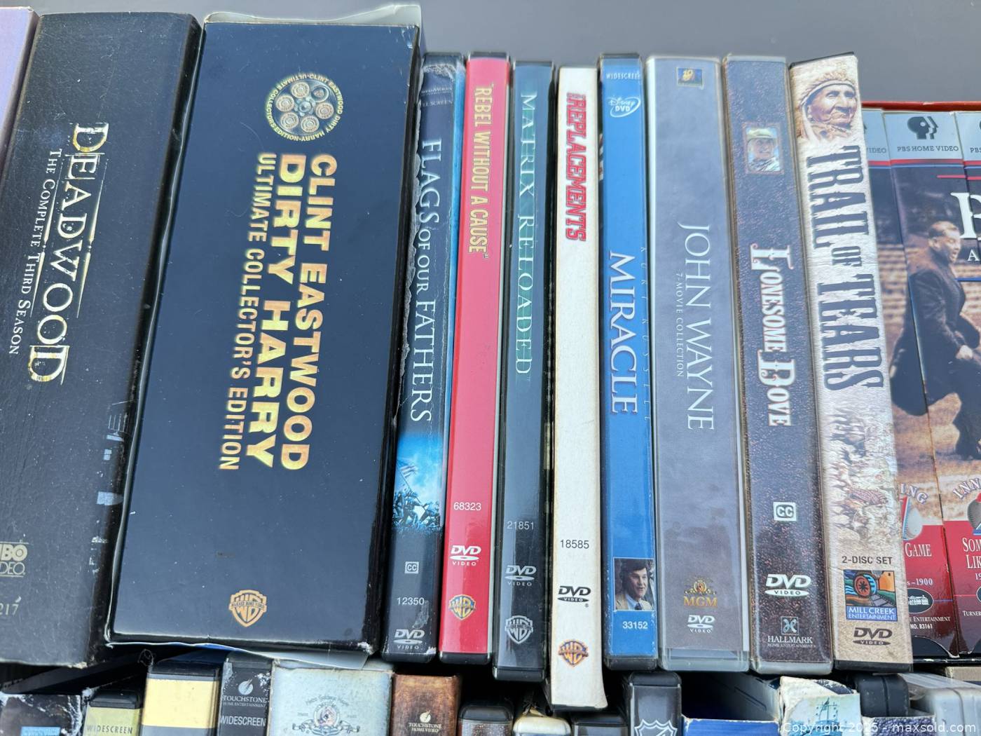 Mixed media lot DVDs VHS CDs 45+ pieces | Maxsold