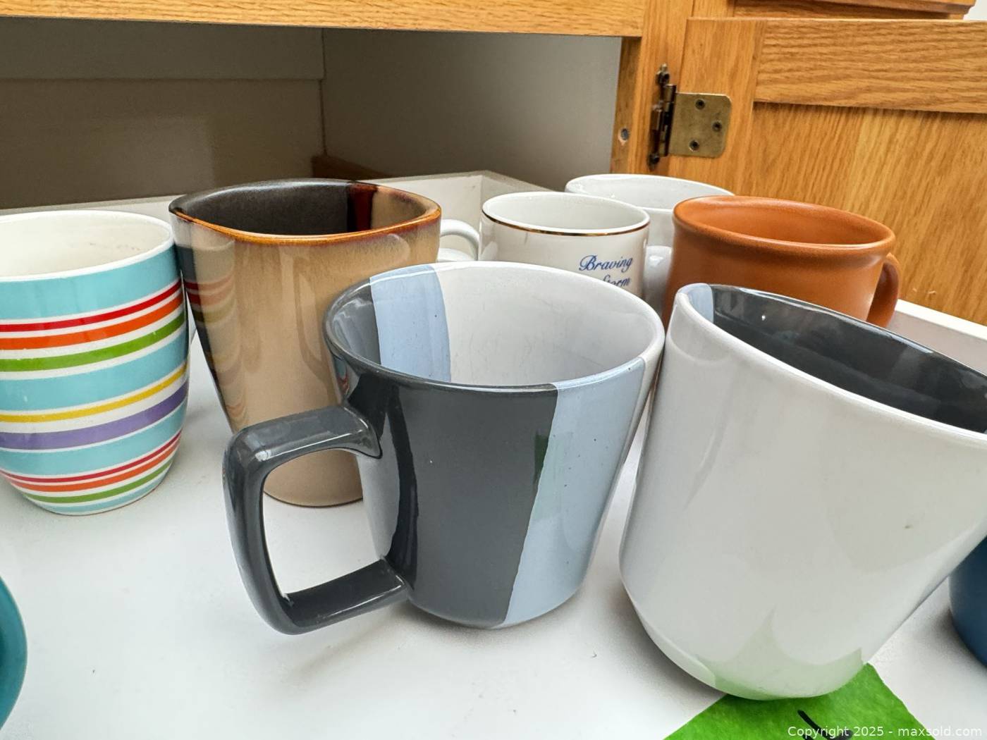 Assorted 13 ceramic coffee mugs | Maxsold