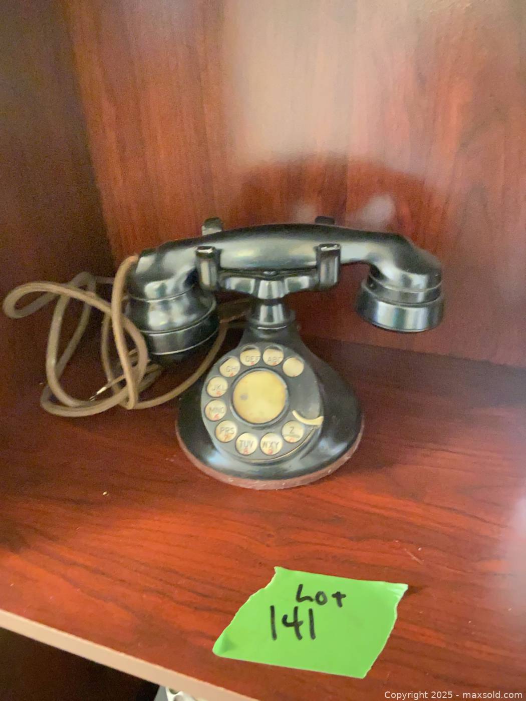 Vintage black rotary dial telephone | Maxsold
