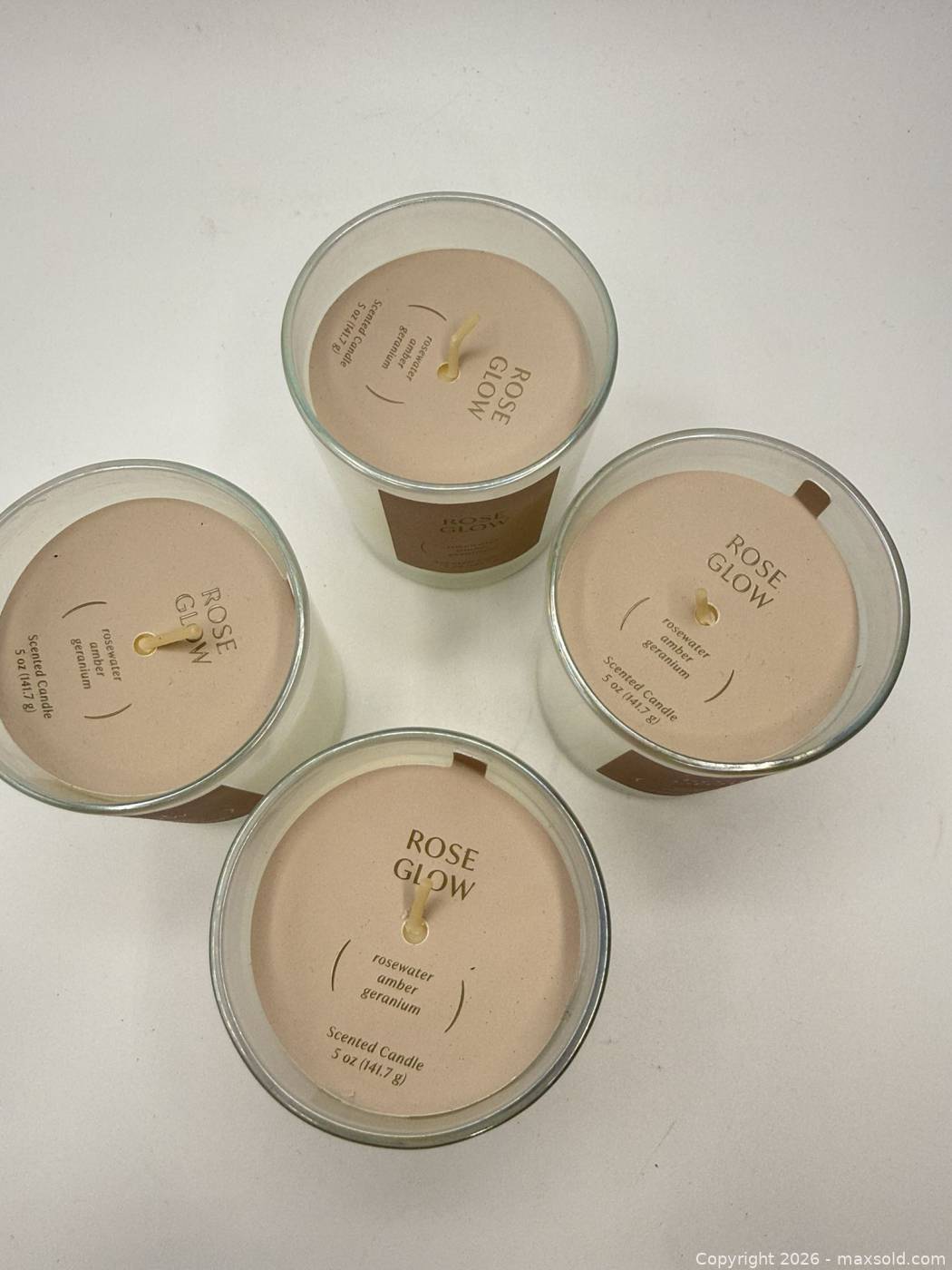 4 Rose Glow rosewater amber geranium candles | Maxsold