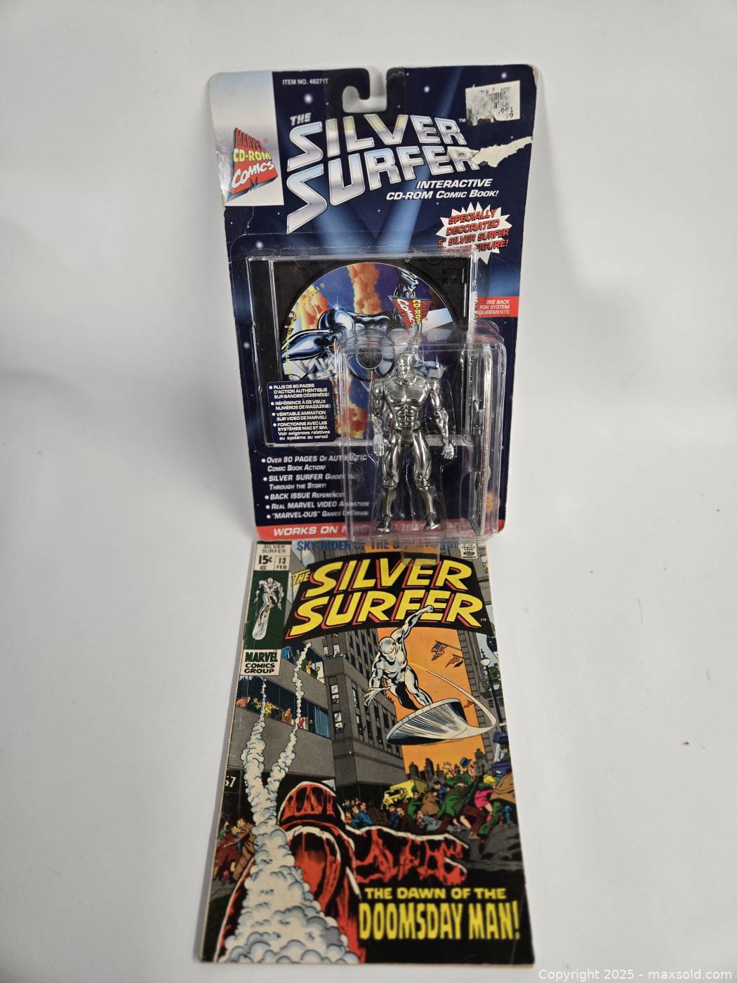 Marvel Silver Surfer CD-ROM Figure & Comic | Maxsold