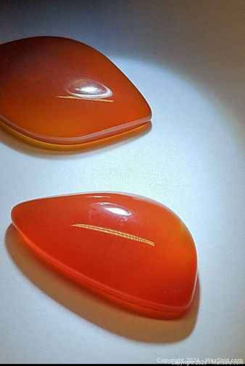 40.13ct natural deep orange-red carnelian pair | Maxsold