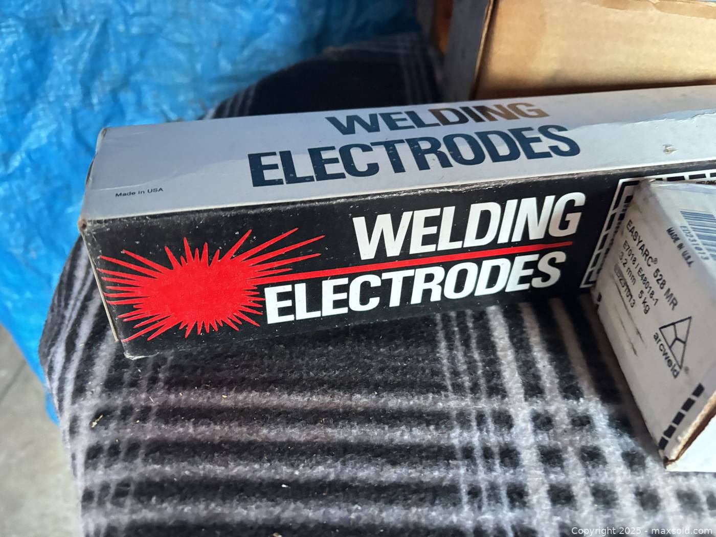 Three boxes welding electrodes | Maxsold