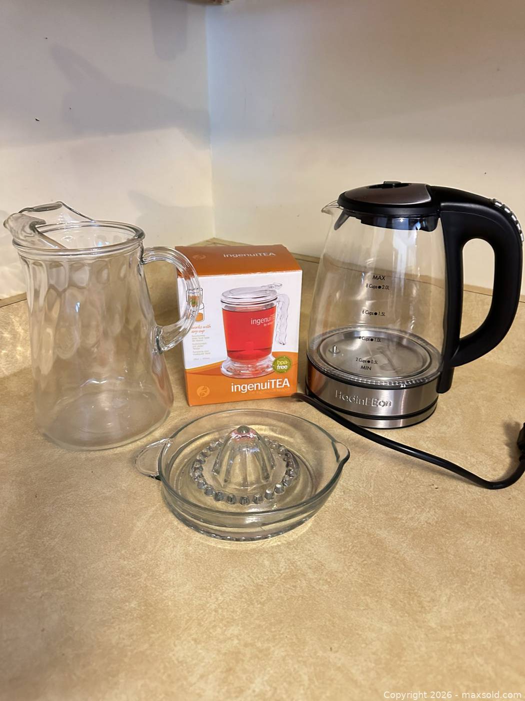IngenuiTEA teapot, orange juicer, pitcher, electric kettle | Maxsold
