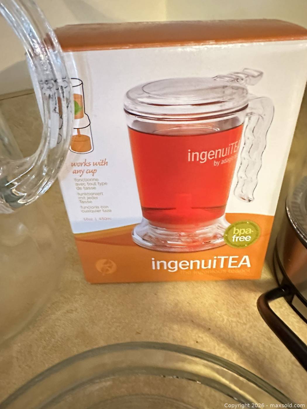 IngenuiTEA teapot, orange juicer, pitcher, electric kettle | Maxsold