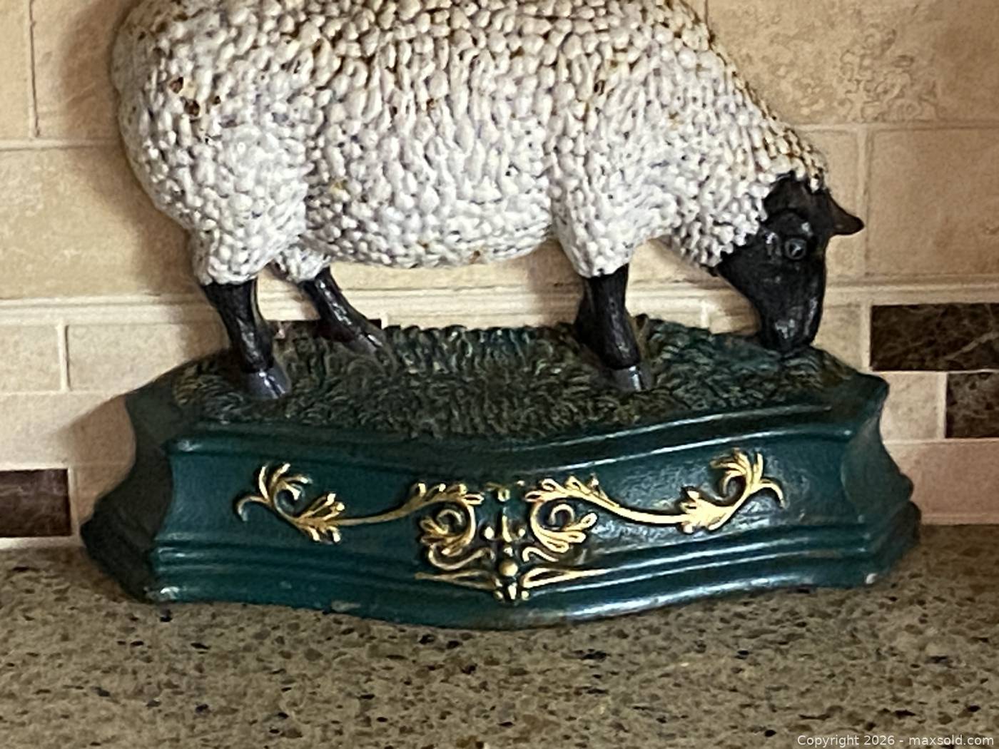Cast iron sheep doorstop | Maxsold