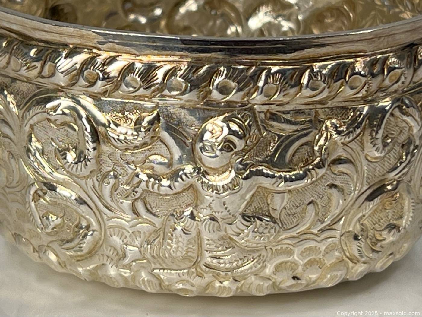 Ornate 75% silver repoussé water bowl | Maxsold