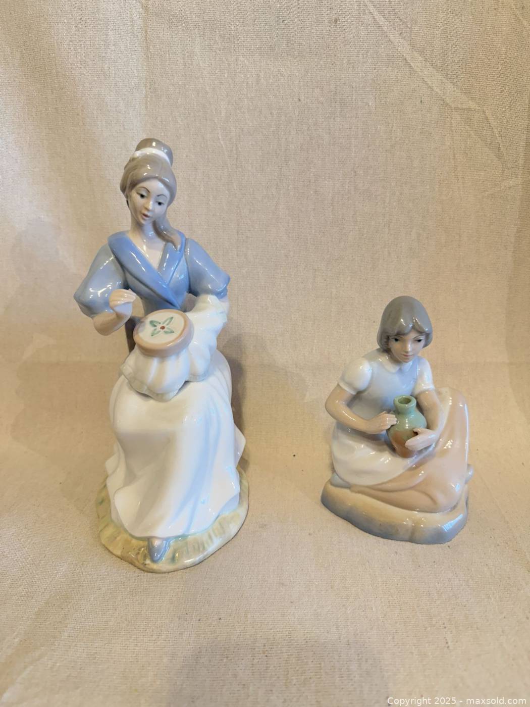 Pair Spanish porcelain figurines | Maxsold