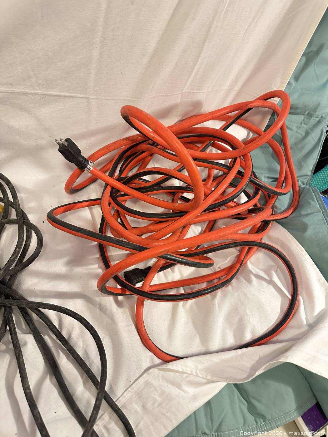 Two heavy-duty 3-prong extension cords | Maxsold