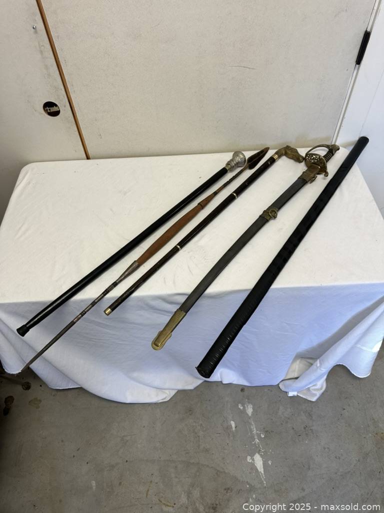 Decorative walking canes, dress sword and katana | Maxsold