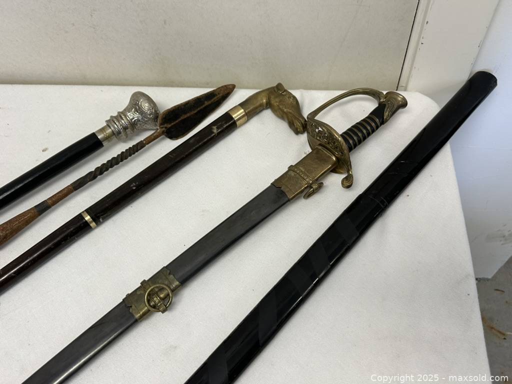 Decorative walking canes, dress sword and katana | Maxsold