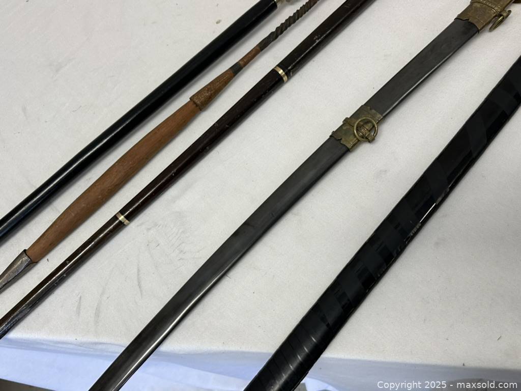 Decorative walking canes, dress sword and katana | Maxsold
