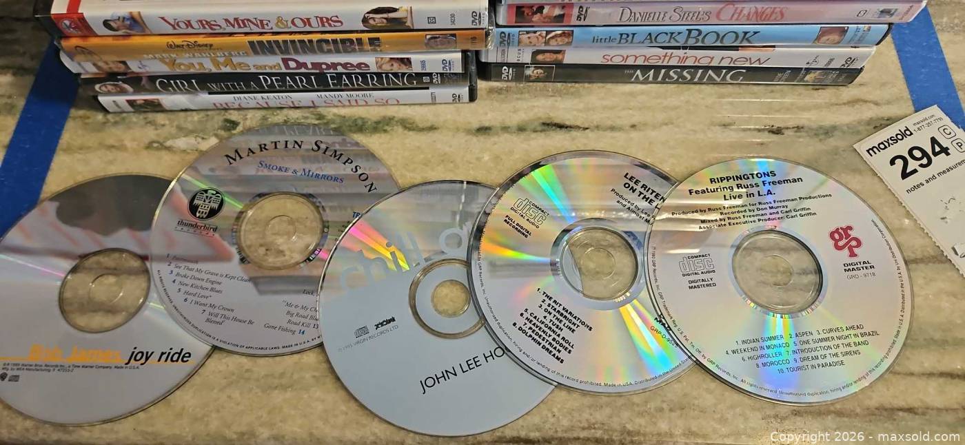 Mixed DVDs, music CDs, sealed VHS sets | Maxsold