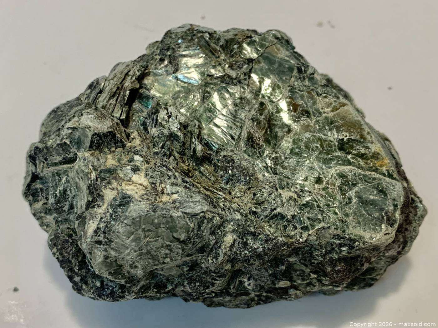 Serpentine mineral specimen green pearly sheen | Maxsold