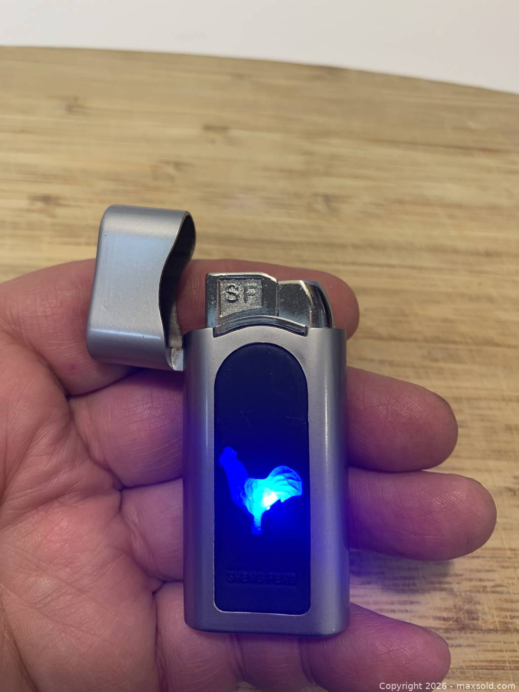 Sheng Feng butane torch lighter with LED | Maxsold