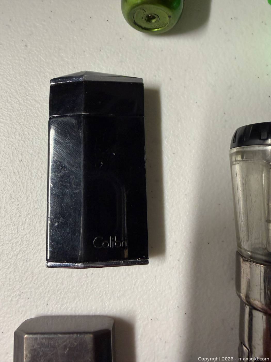 Colibri and assorted lighters | Maxsold