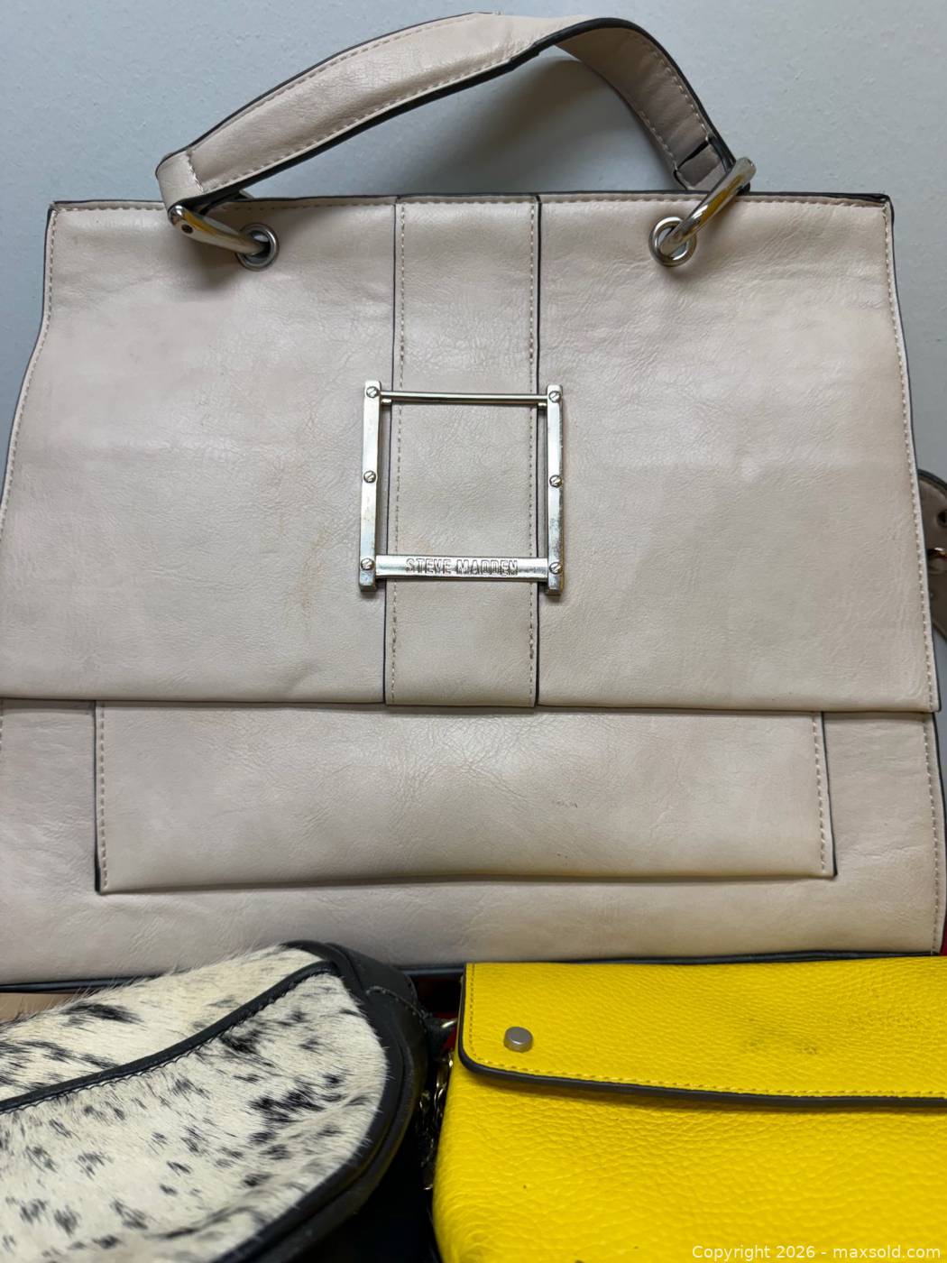Five women’s handbags | Maxsold