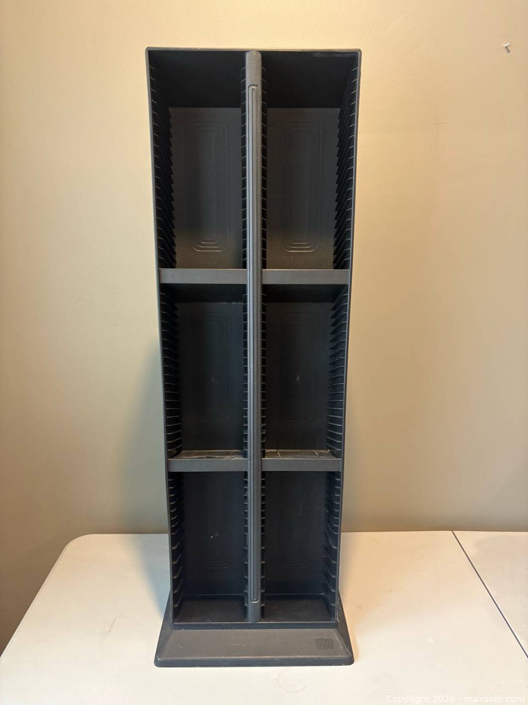 Black plastic CD tower | Maxsold