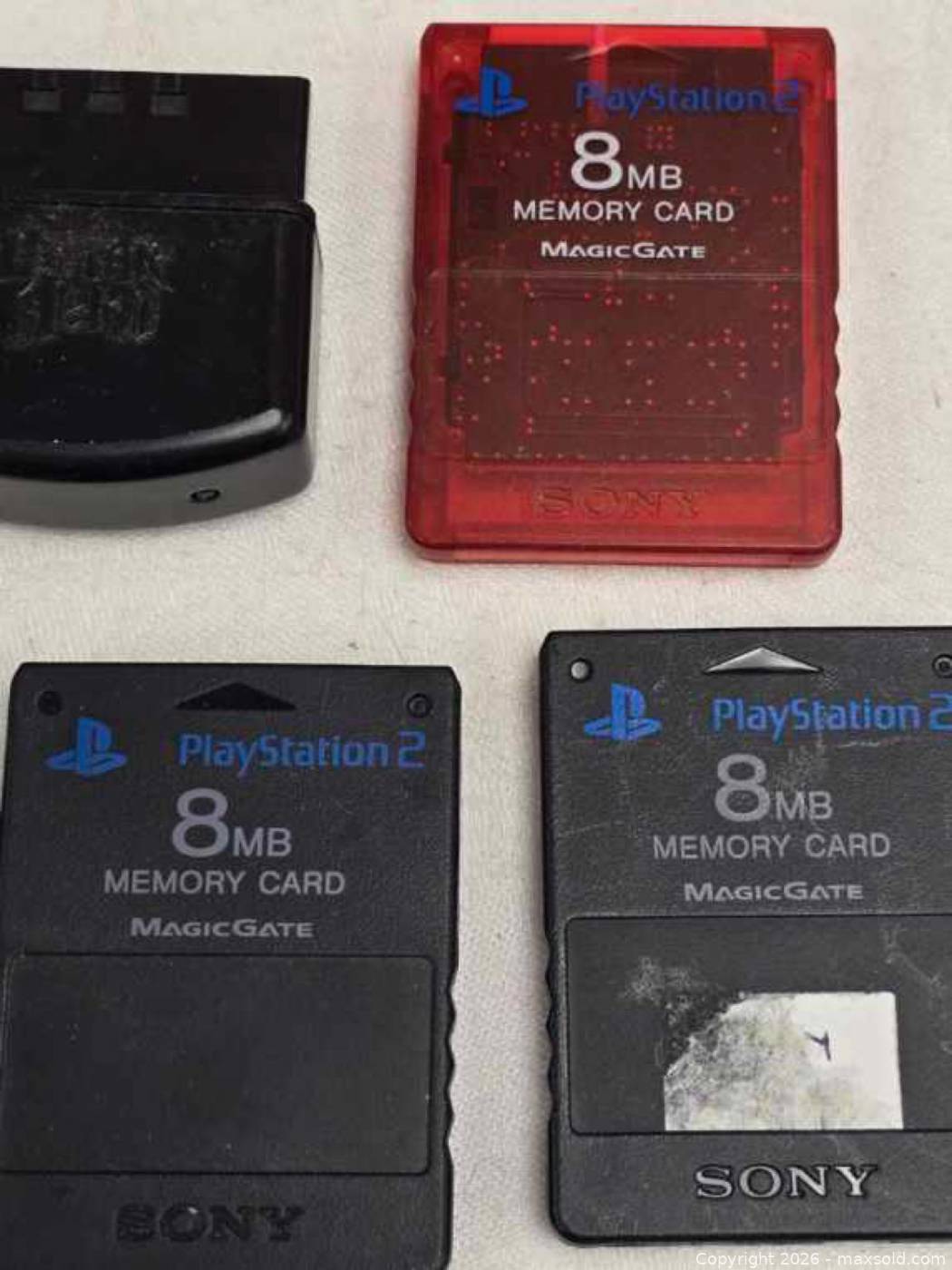 Sony PS2 8 MB memory cards, cases, Sims 2 GBA, guitar receiver | Maxsold