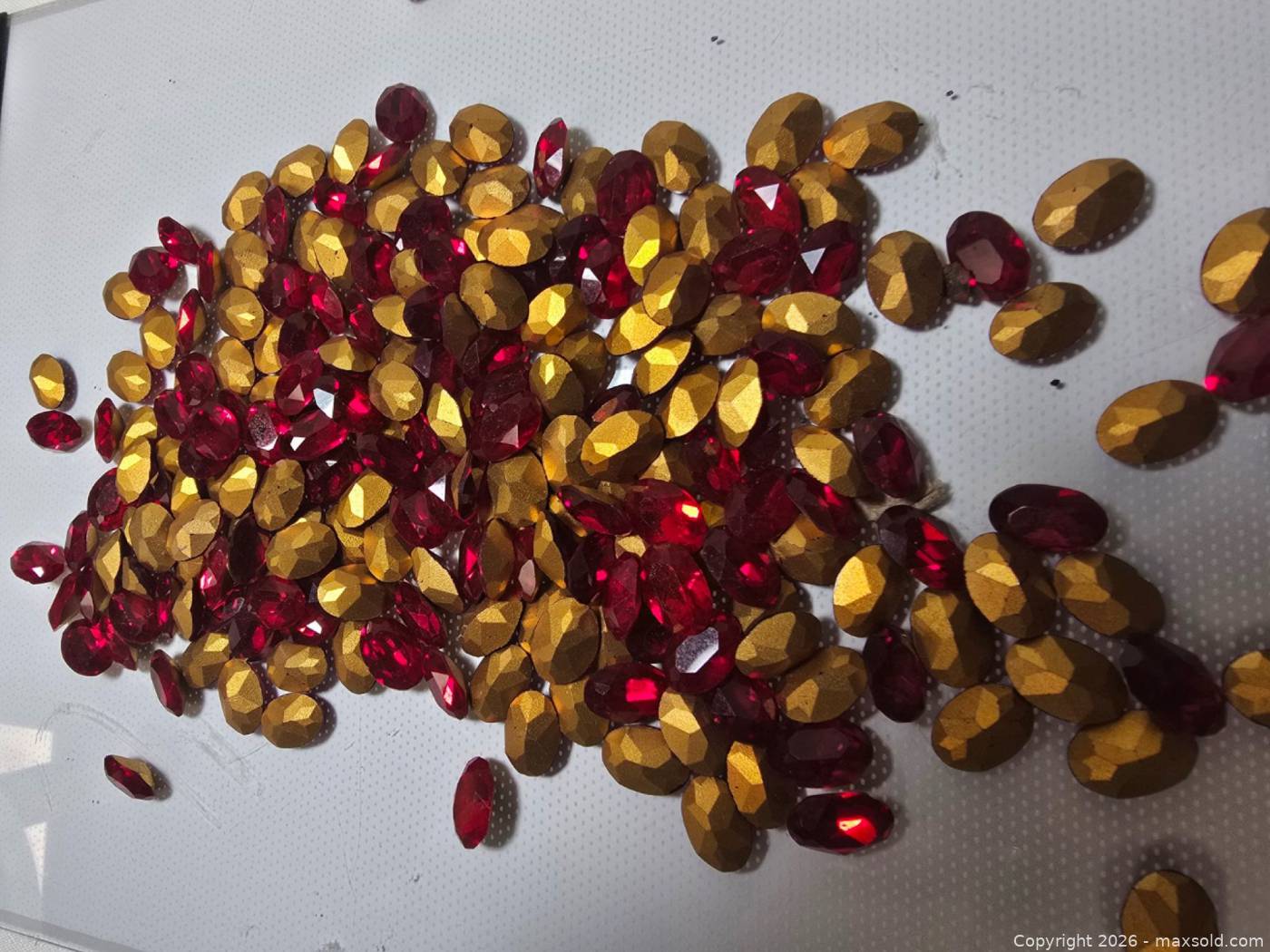 Ruby red glass rhinestones bulk lot | Maxsold