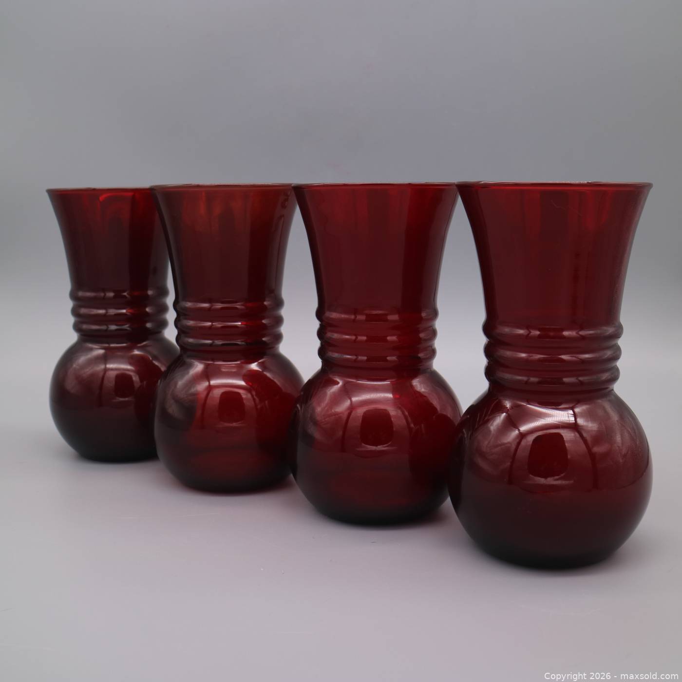 4 Anchor Hocking ruby red ribbed glass vases | Maxsold