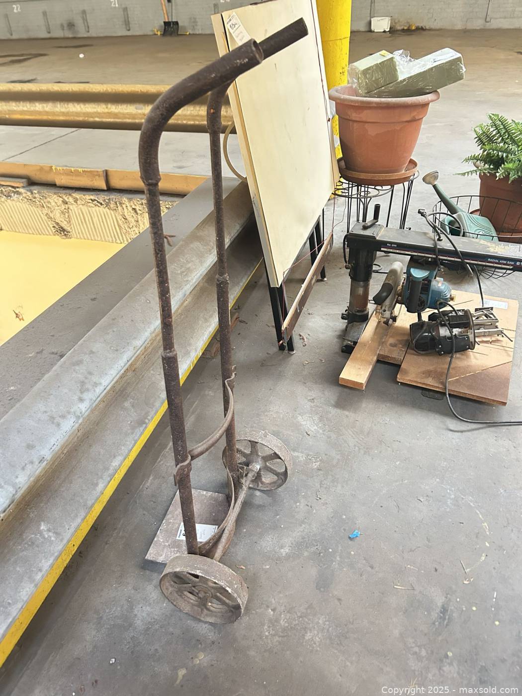 Antique cast-iron two-wheel hand truck | Maxsold